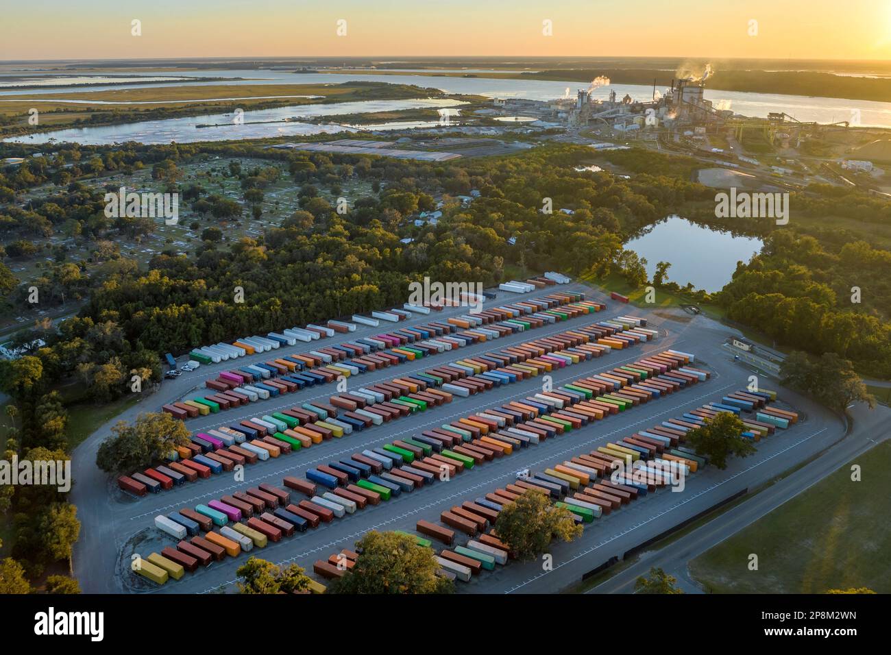Aerial view of large cargo container yard with rows of freight ...