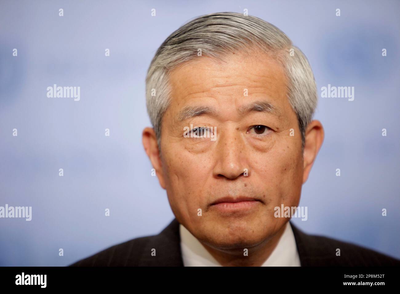 Yukio Takasu, the Japanese Ambassador to the United Nations, takes ...