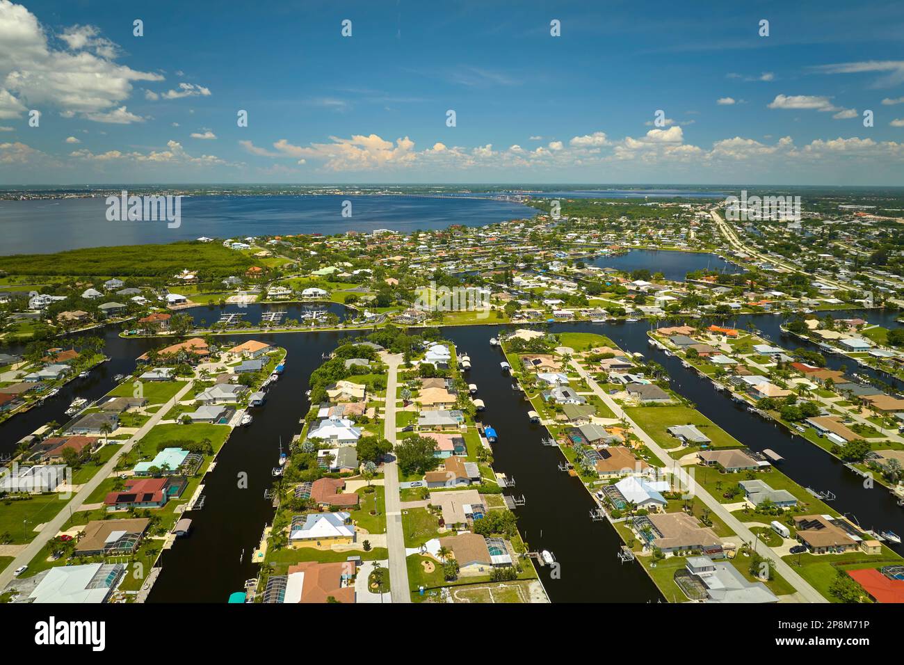 Aerial view of rural private houses in remote suburbs located on sea ...