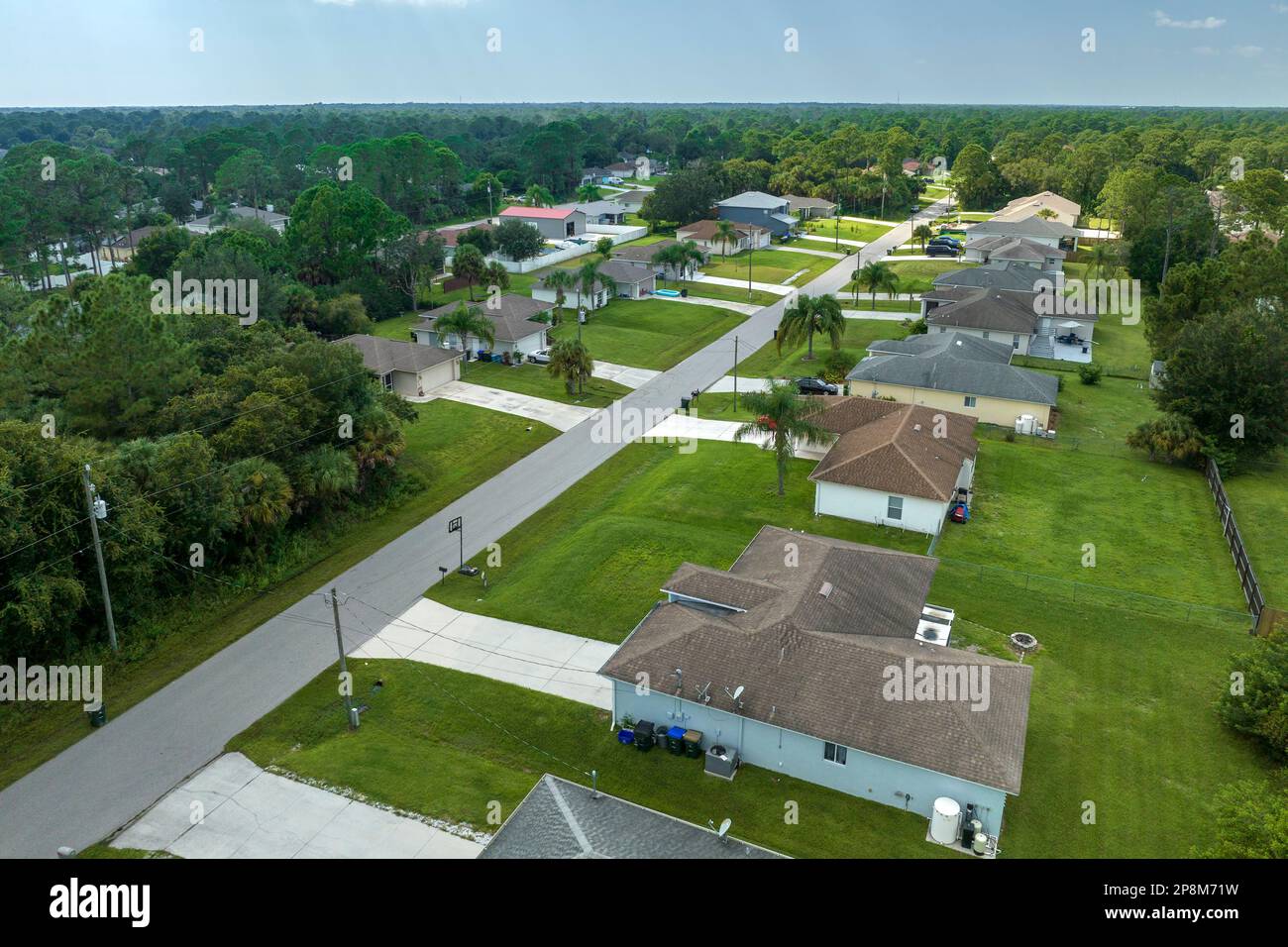 Aerial view of small town America suburban landscape with private homes ...