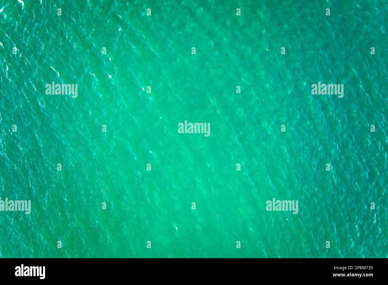 Aerial view of seascape surface of green sea water with small ripple ...