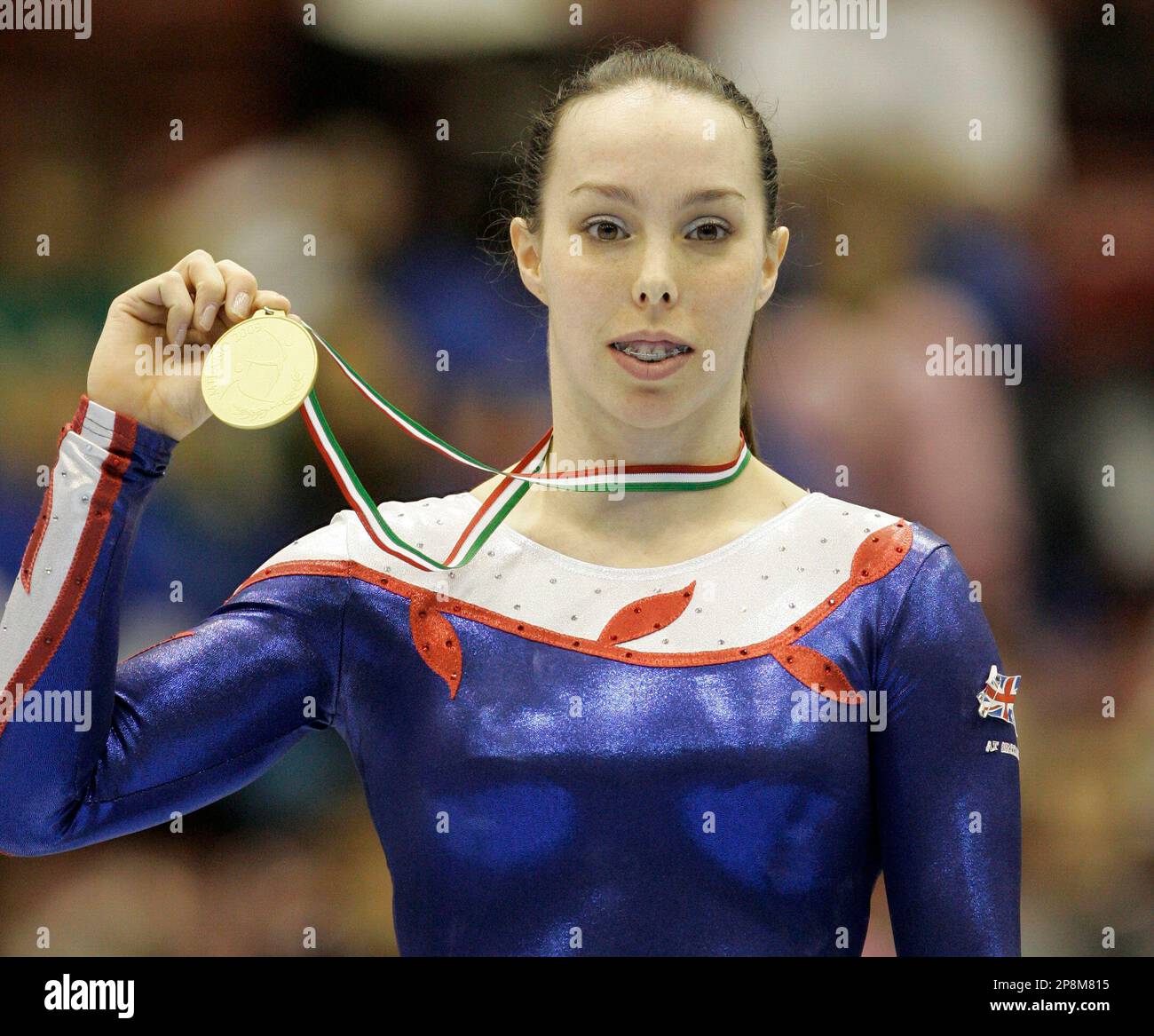 Britain's Elizabeth Tweddle celebrates on podium after winning the gold ...