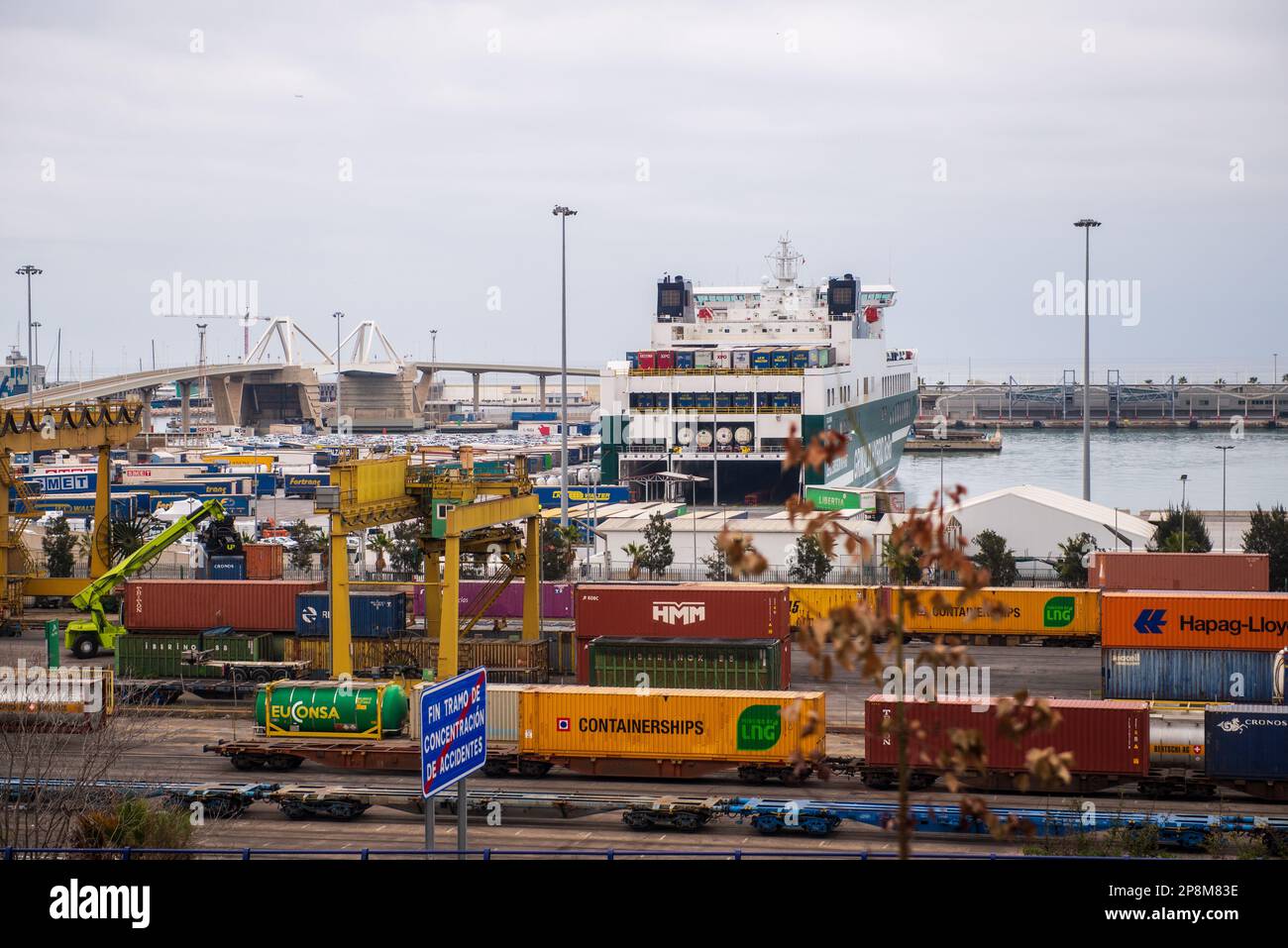 View of a A Ro-Ro Ship in port next to shipping containers at a ...