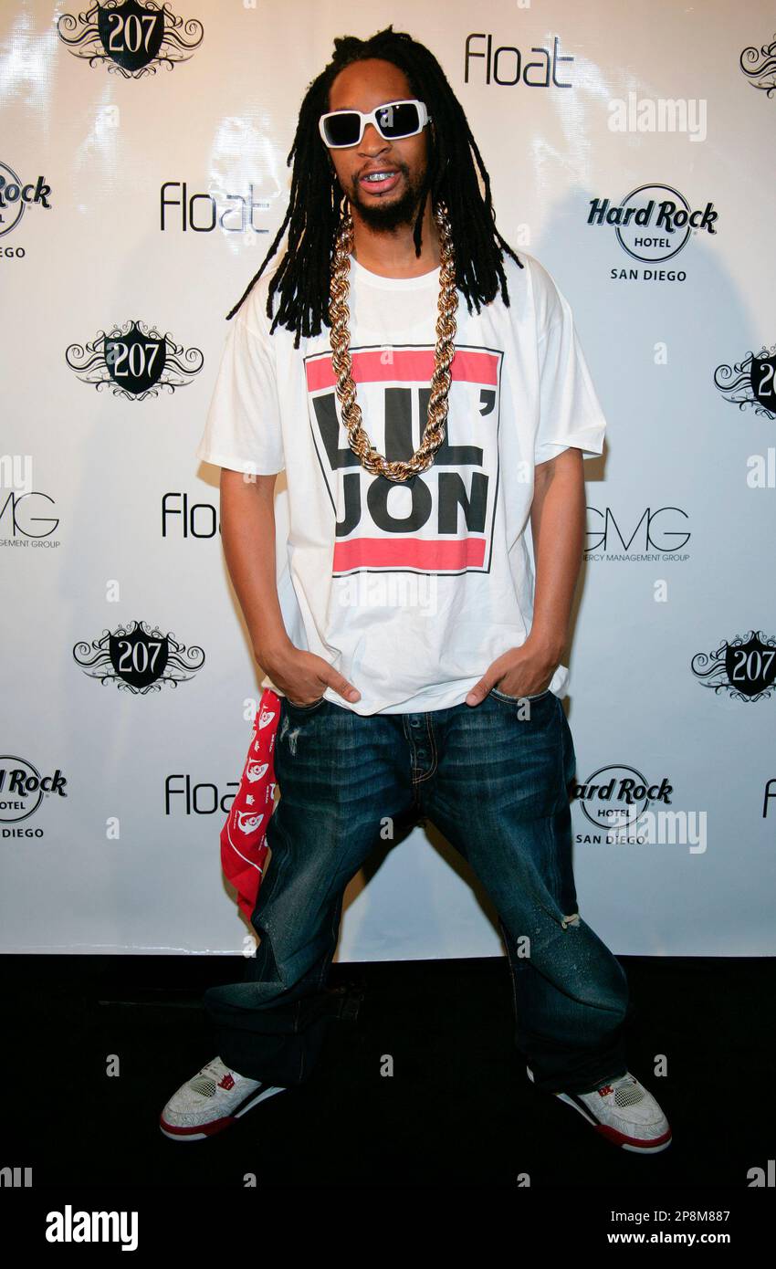 Rapper Lil' John arrives on the red carpet at the grand opening of 207 ...