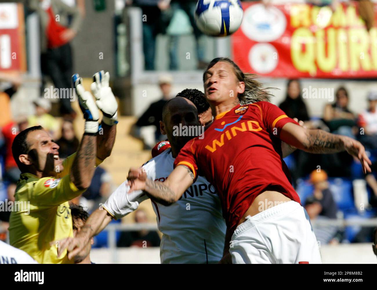 AS Roma defender Philippe Mexes, of France, right, jumps for a header ...