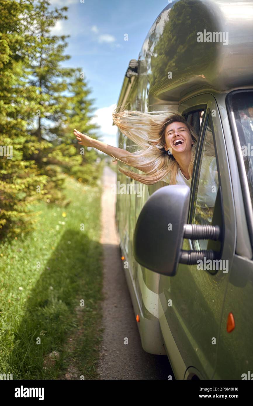 Driving with head out window hi-res stock photography and images - Alamy