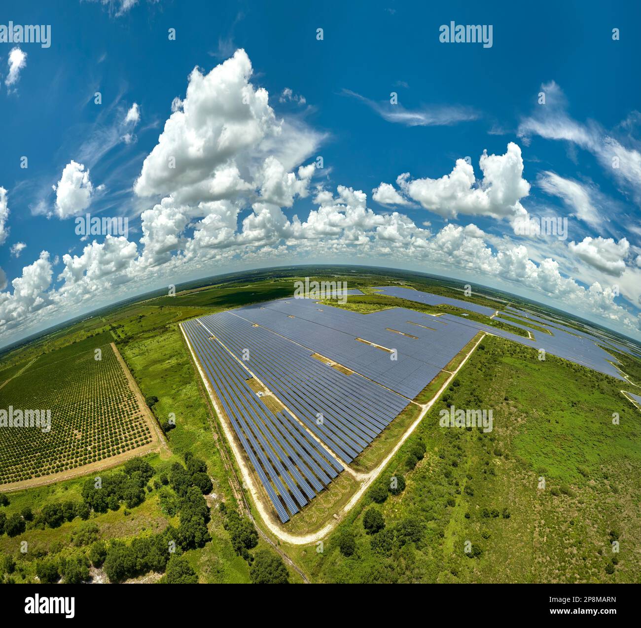 Aerial view of sustainable electric power plant between agricultural ...