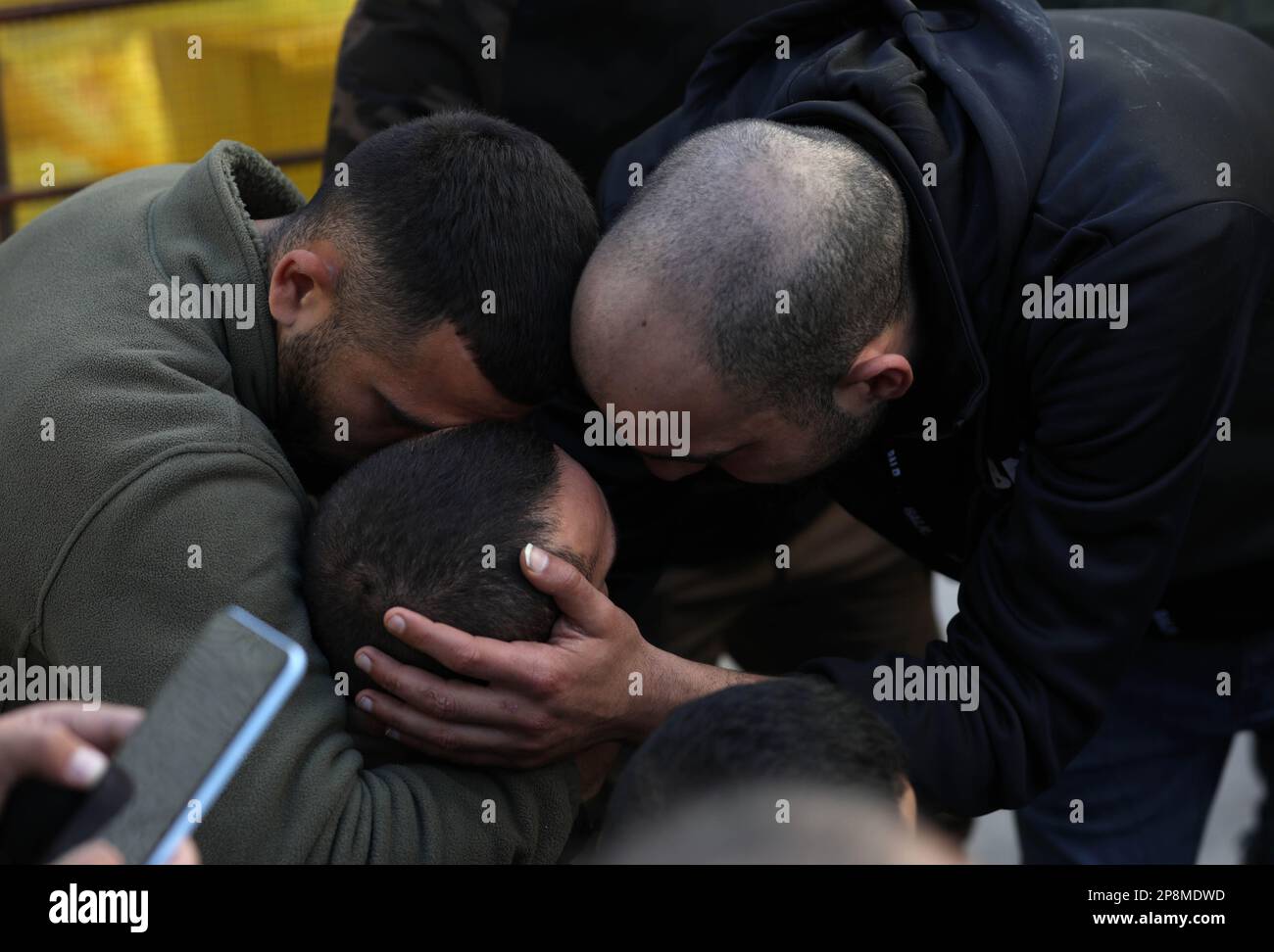 Jenin. 9th Mar, 2023. People mourn during the funeral of Palestinians ...