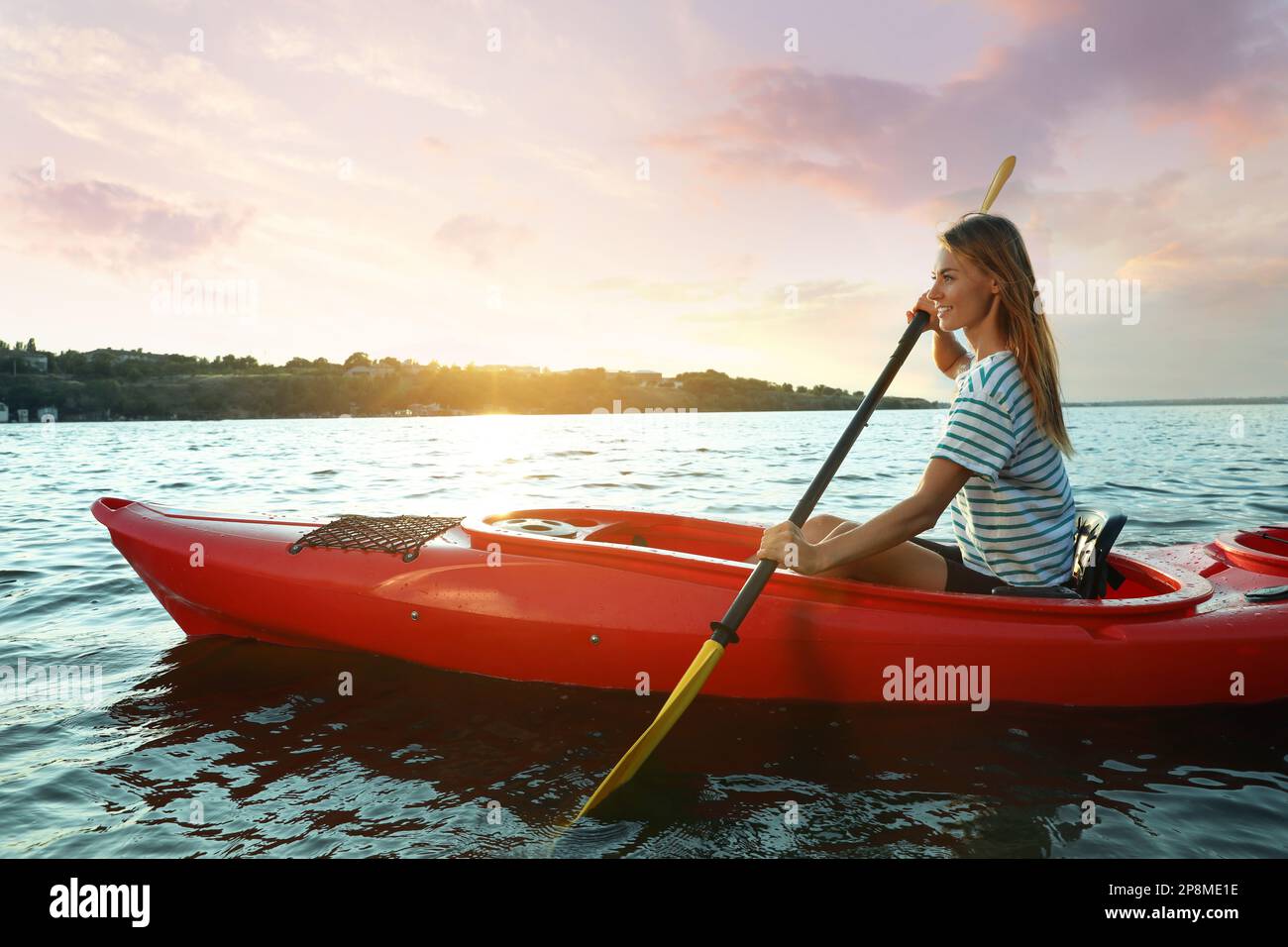 Happy woman kayaking on river. Summer activity Stock Photo - Alamy