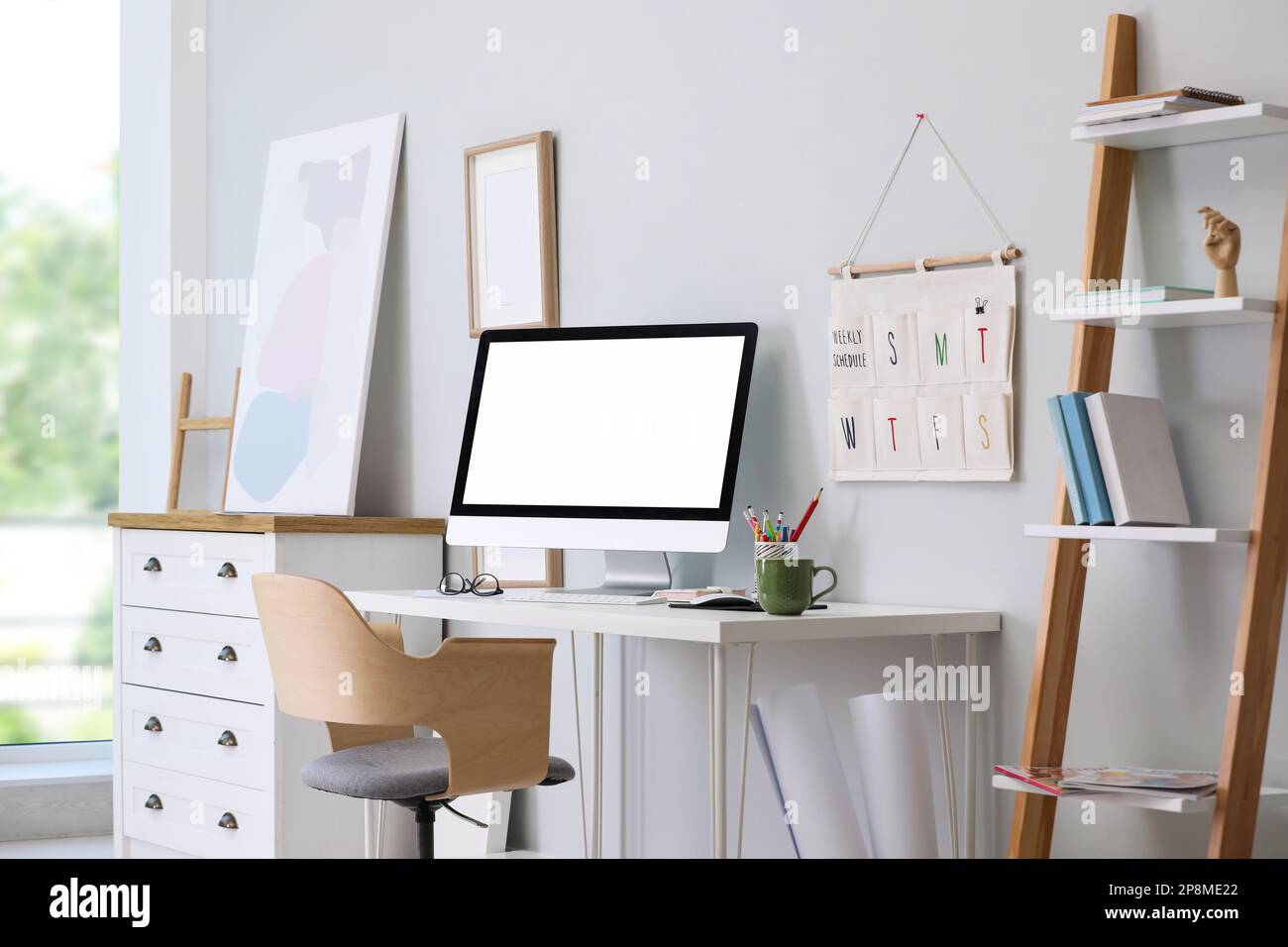 Comfortable workplace with modern computer and stylish furniture in ...