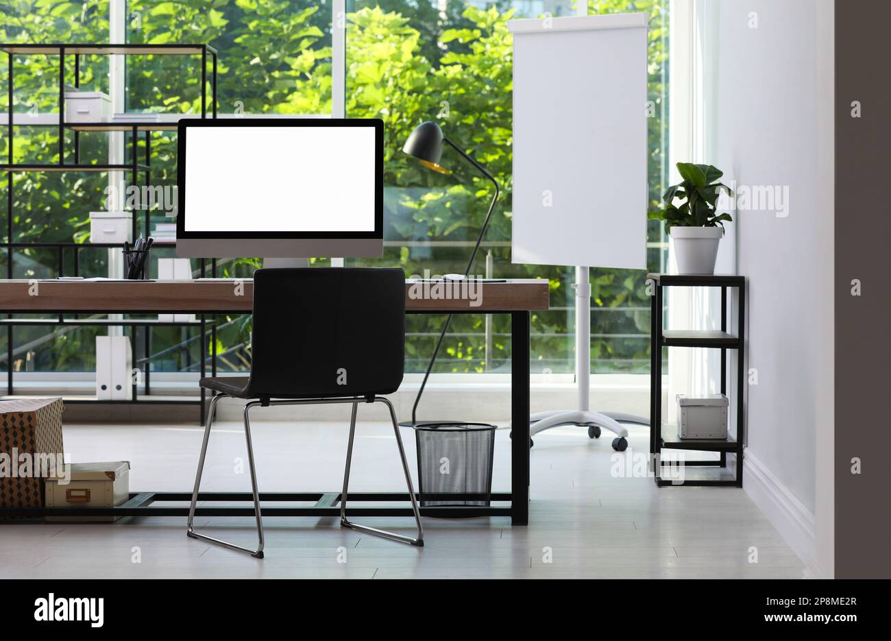 Comfortable workplace with modern computer and stylish furniture in ...