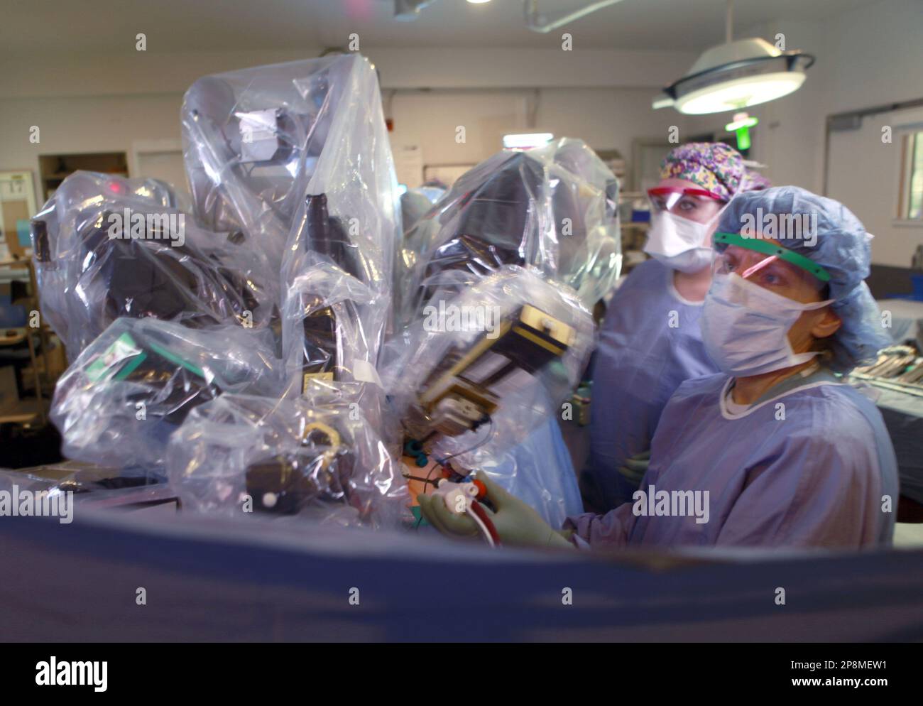 In this recent photo, a robot is sealed in plastic prior to surgery at ...