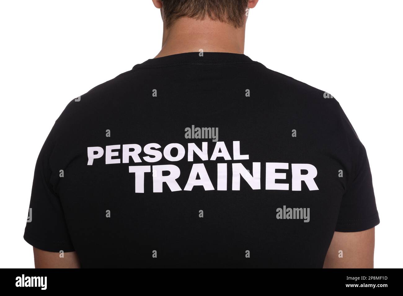 Closeup of personal trainer in uniform on white background, back view ...