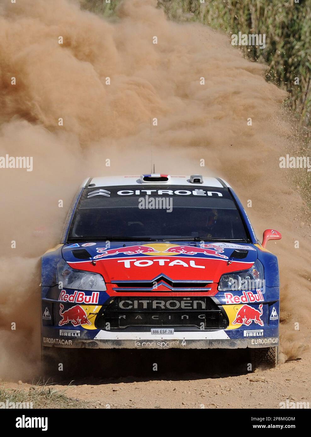 Sebastien Loeb of France and his co-driver Daniel Elena drive their ...