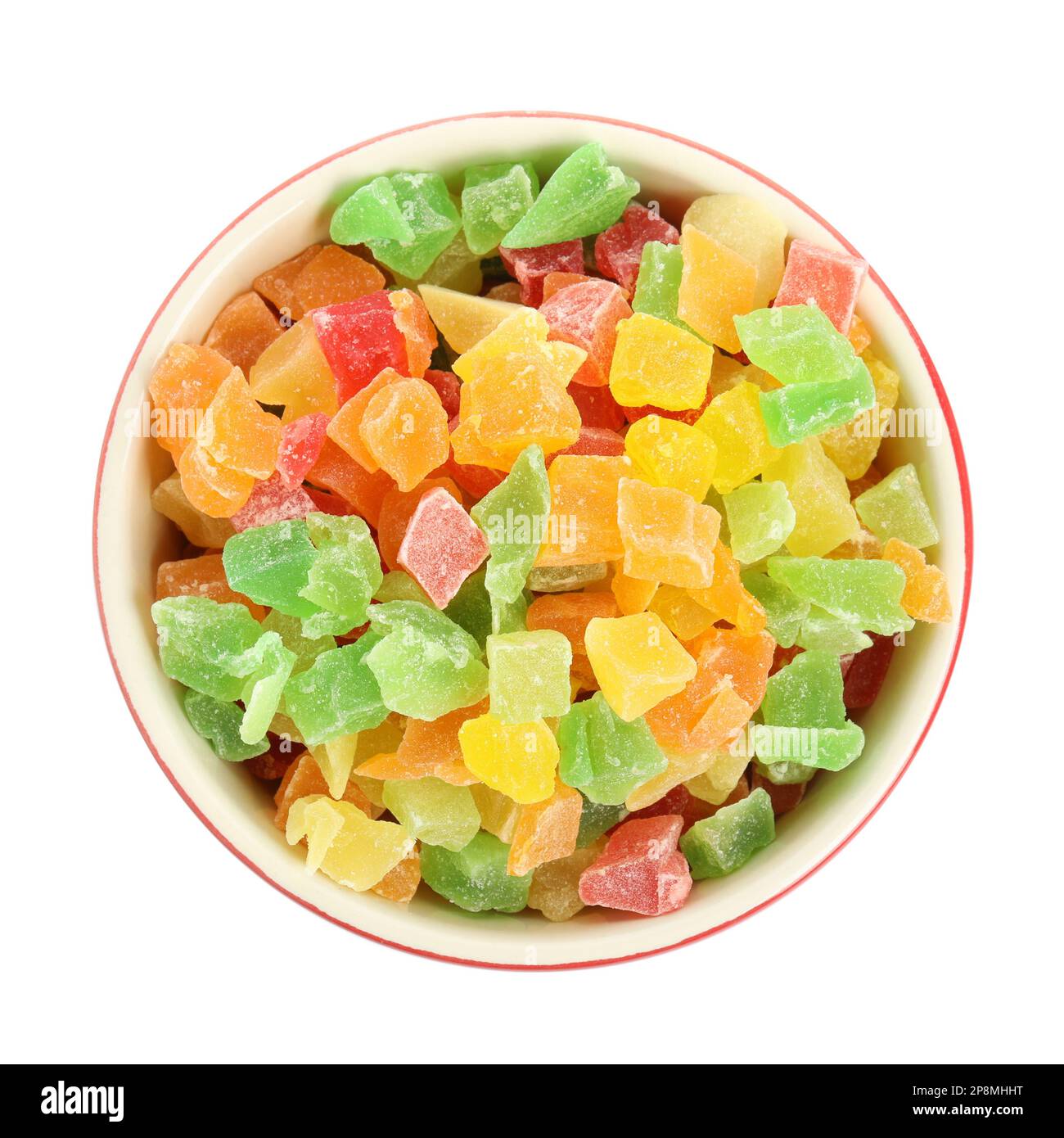 Mix of delicious candied fruits in bowl isolated on white, top view ...
