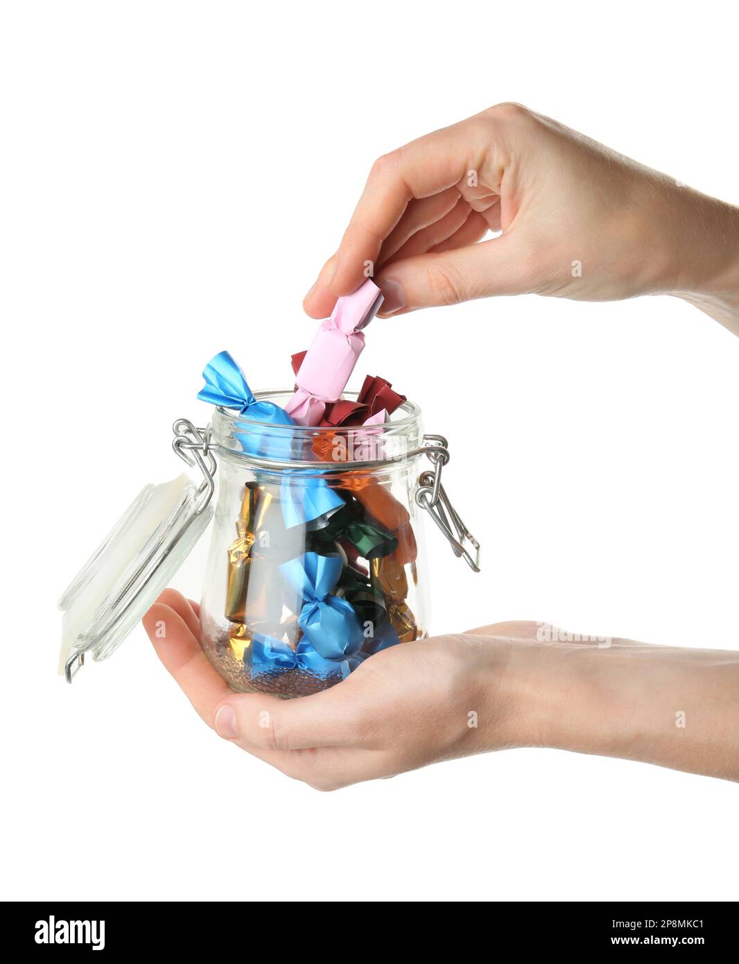 Holding candy wrapper Cut Out Stock Images & Pictures - Alamy