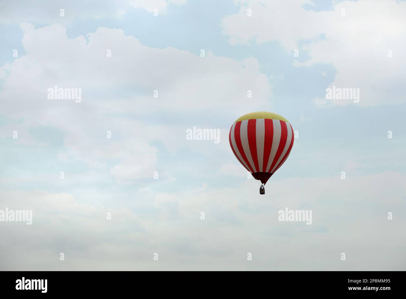 View of hot air balloon in blue sky, space for text Stock Photo - Alamy
