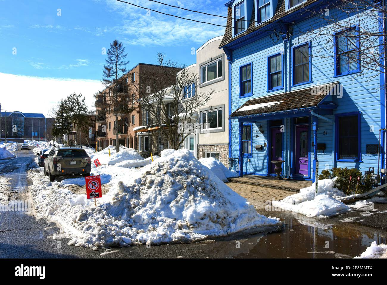 Ottawa, Canada - March 5, 2023: City street in Ottawa with melting snow ...