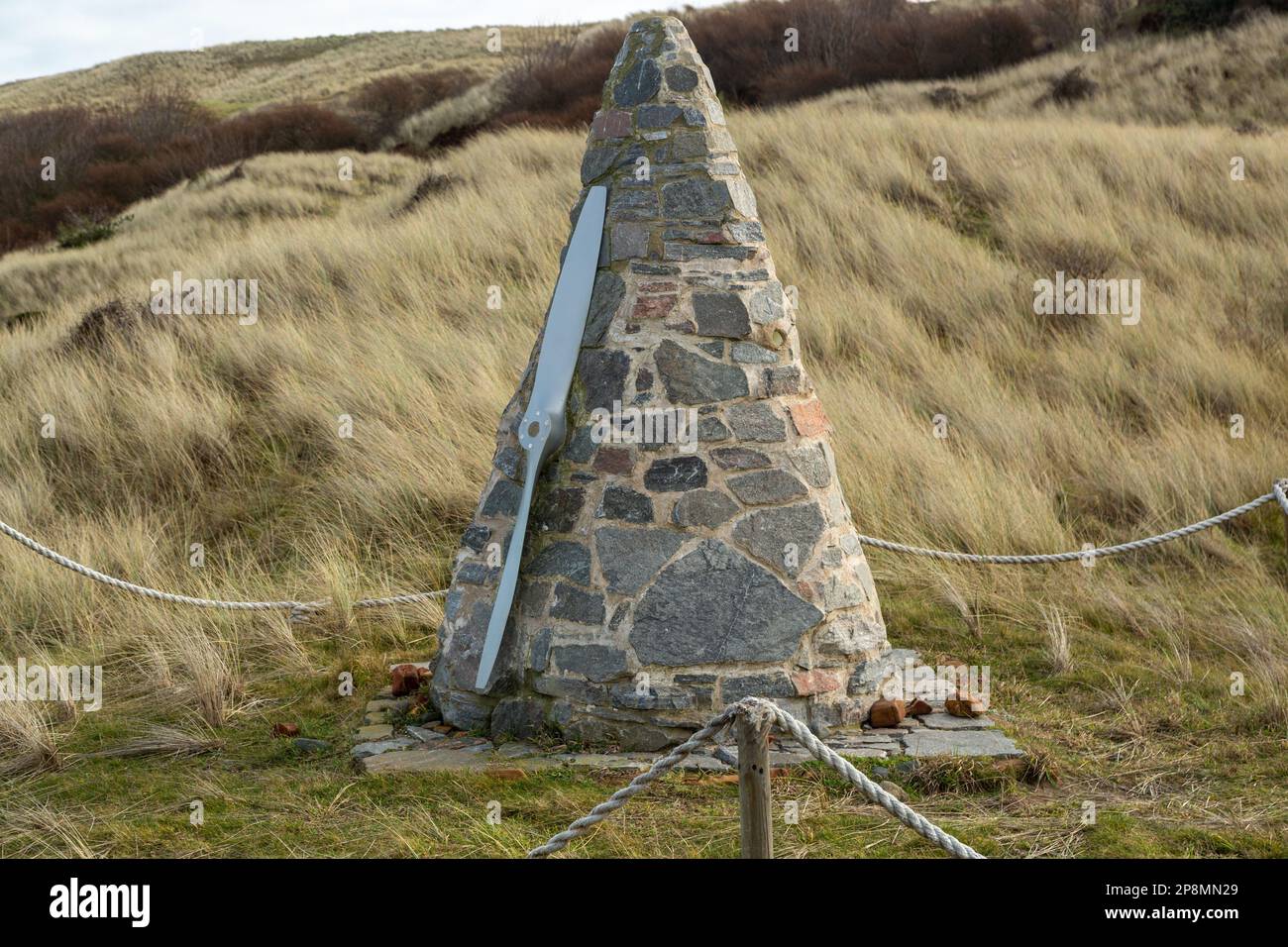 Memorial cairn, dedicated to the 15th Duke of Hamilton with a propeller ...