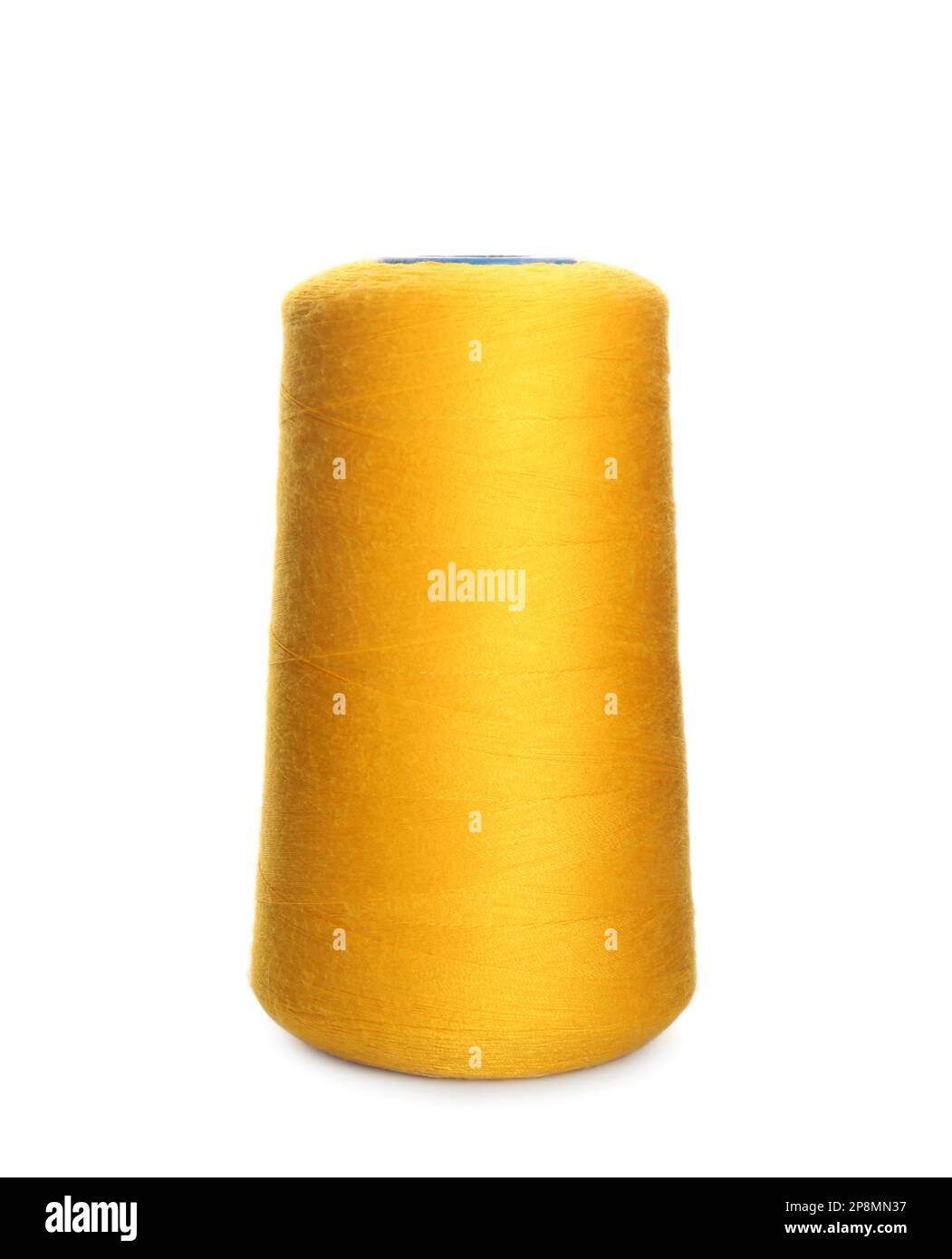 Spool of yellow sewing thread isolated on white Stock Photo - Alamy