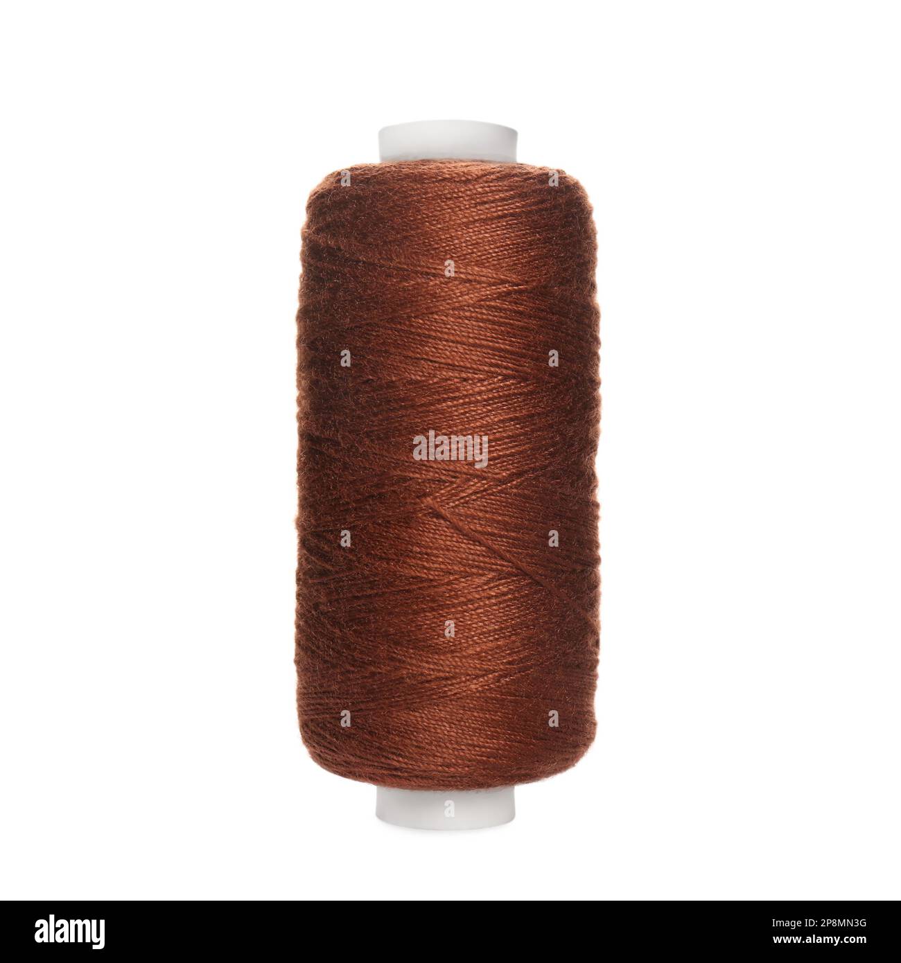 Spool of brown sewing thread isolated on white Stock Photo - Alamy