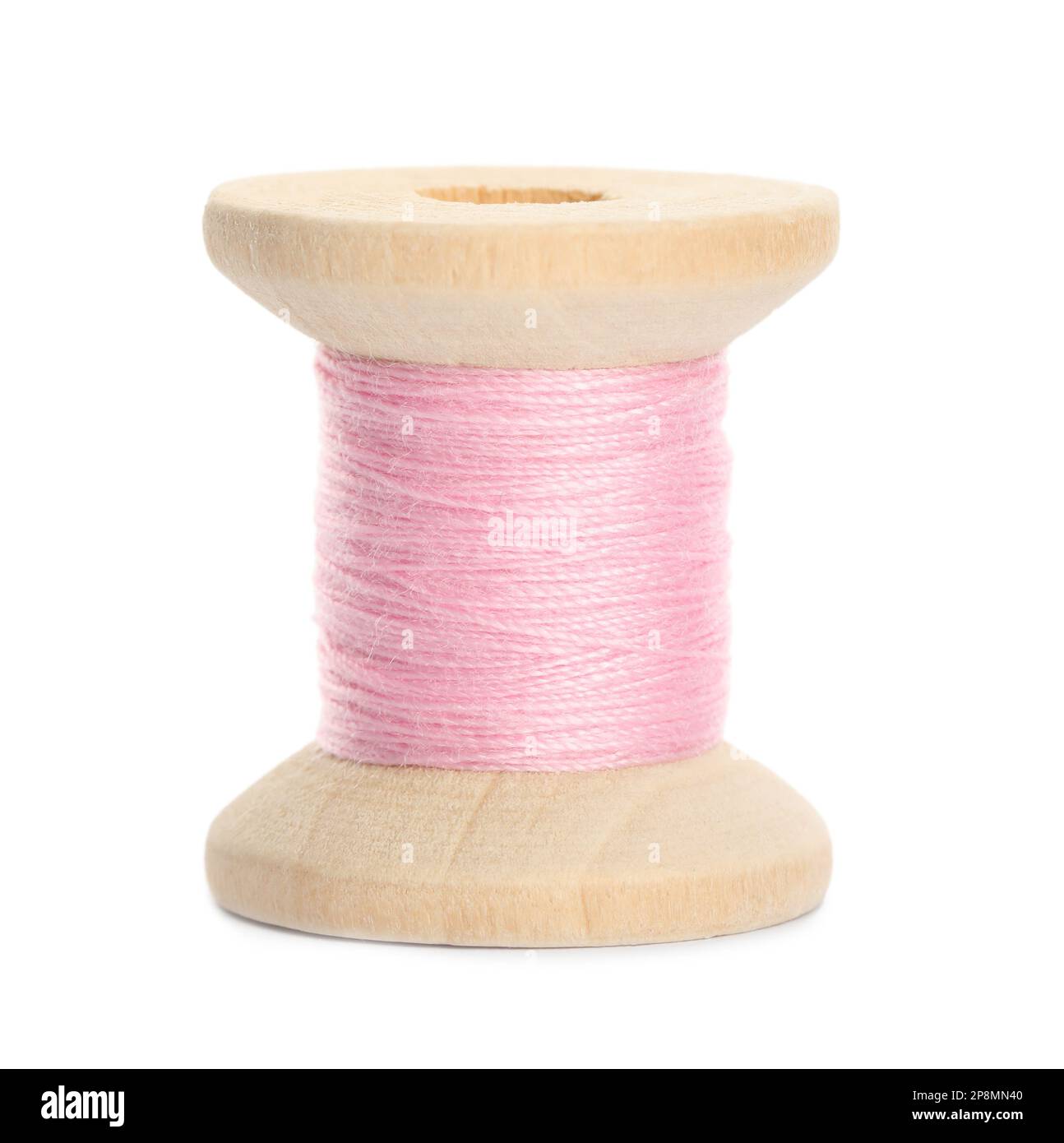 Wooden spool of pink sewing thread isolated on white Stock Photo - Alamy