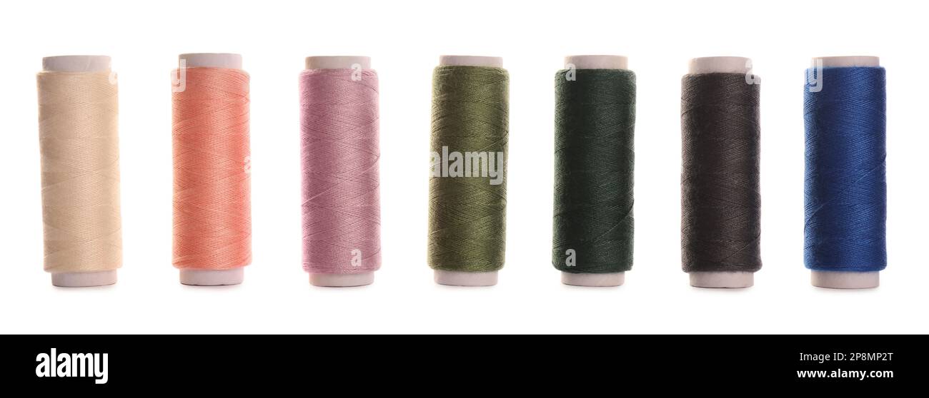 Set of colorful sewing threads on white background Stock Photo - Alamy