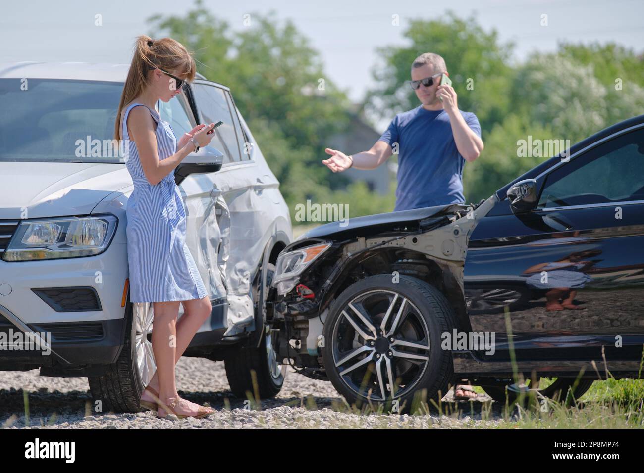 Drivers of smashed vehicles talking on cellphone calling for help in ...