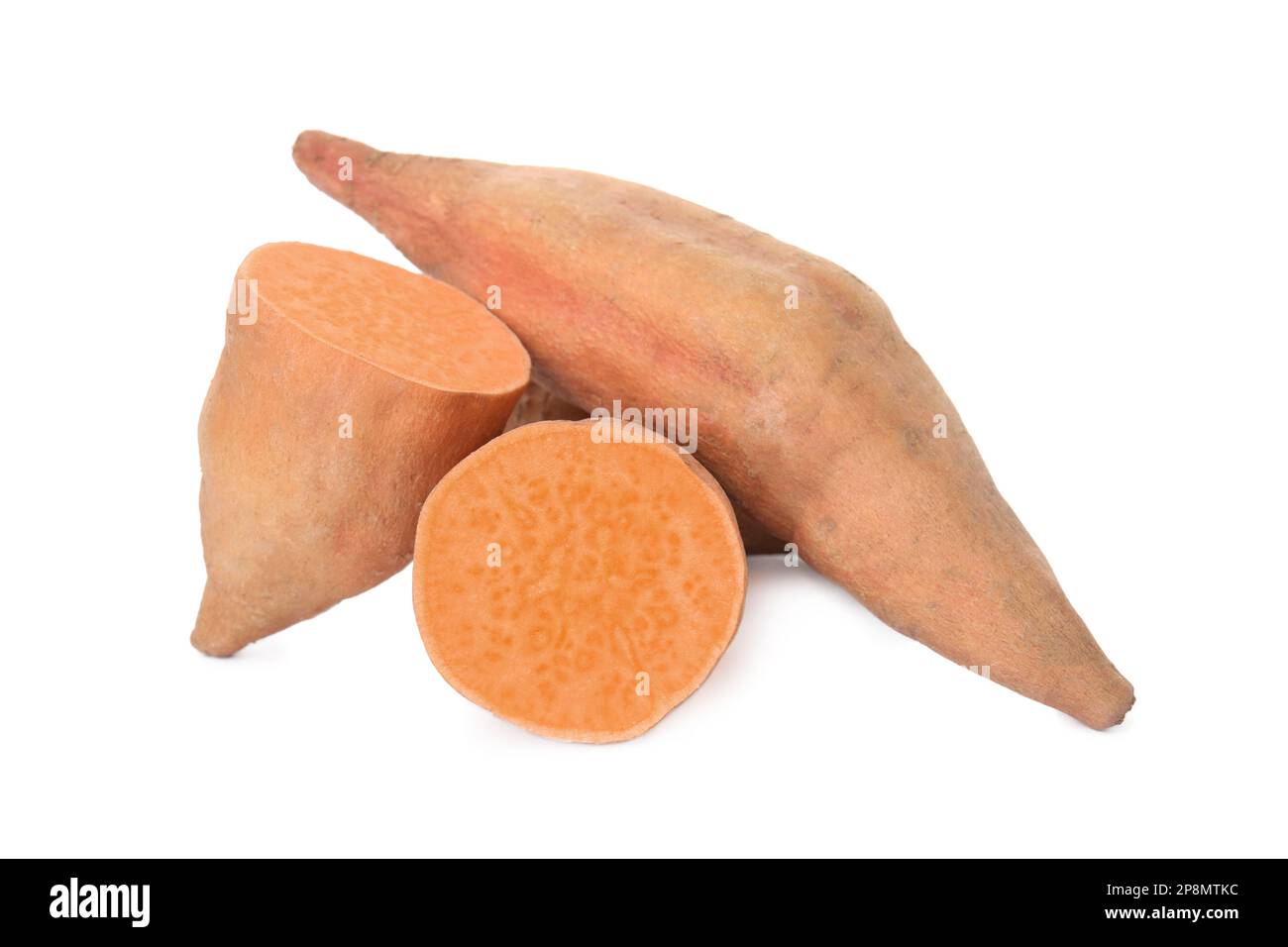 Whole and cut ripe sweet potatoes on white background Stock Photo - Alamy