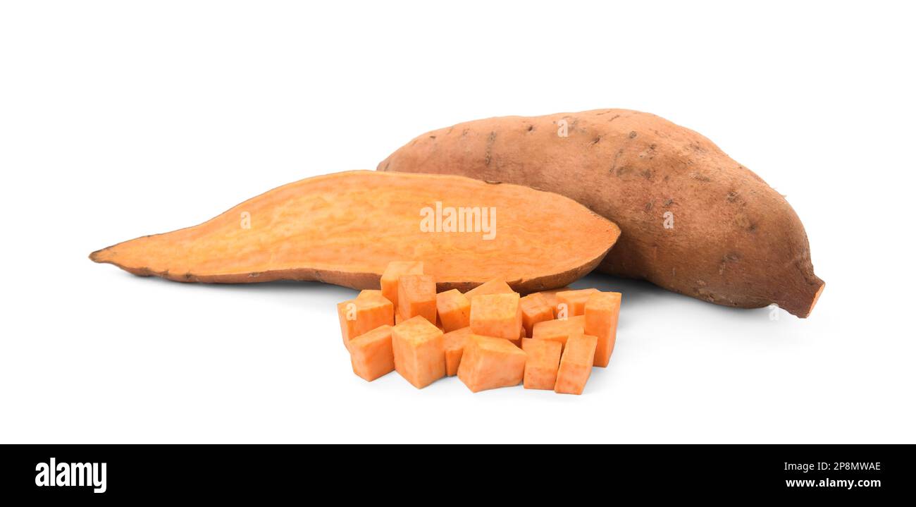 Cut and whole sweet potatoes on white background Stock Photo - Alamy