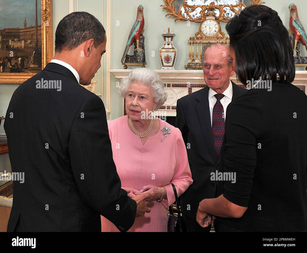 US President Barack Obama and his wife Michelle, in conversation with ...
