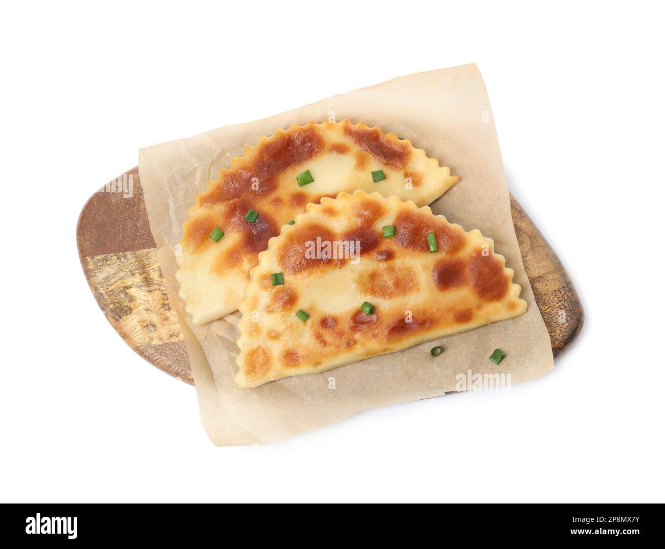 Board with delicious fried chebureki isolated on white, top view Stock ...