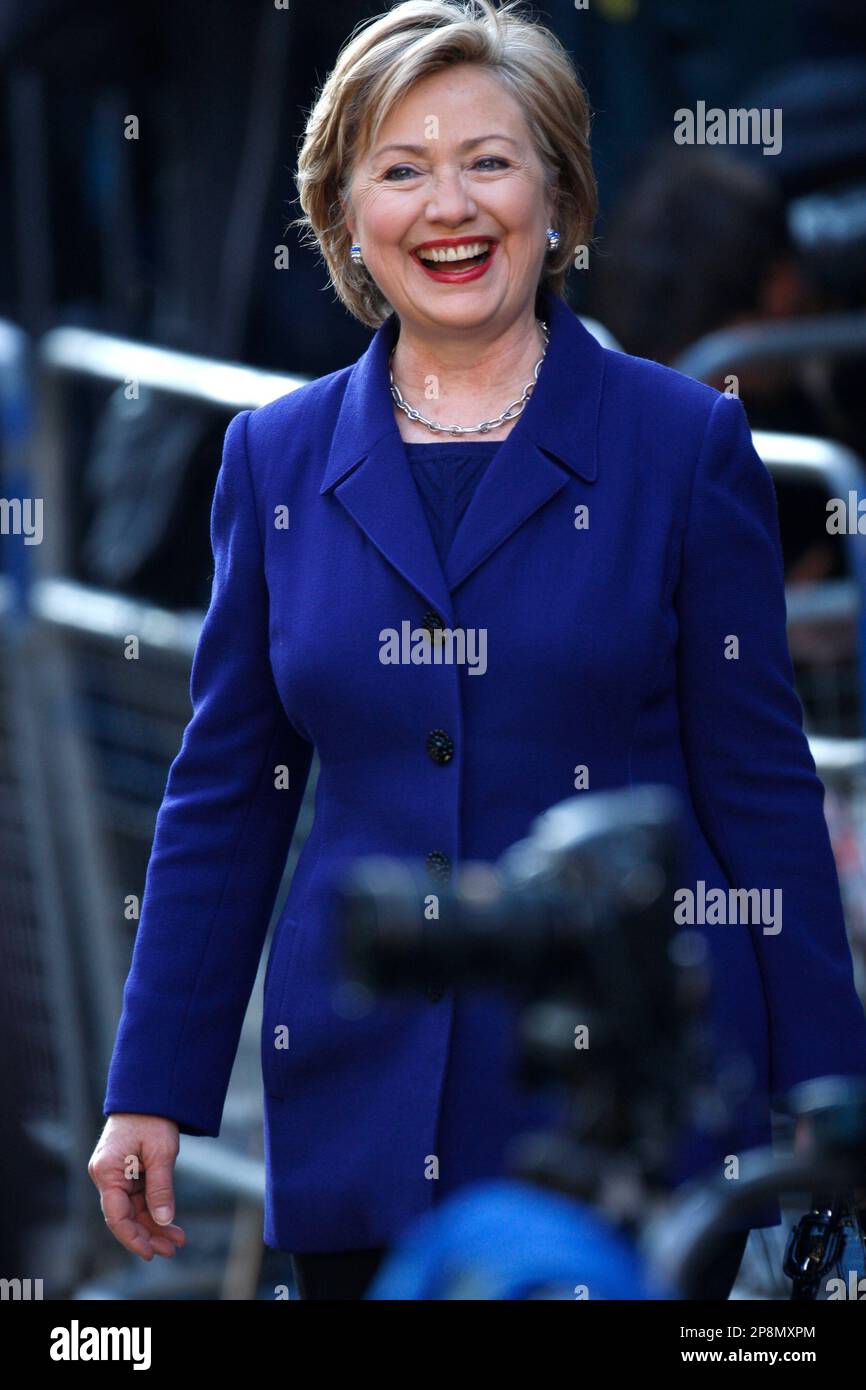 U.S. Secretary of State, Hillary Rodham Clinton smiles as she arrives ...