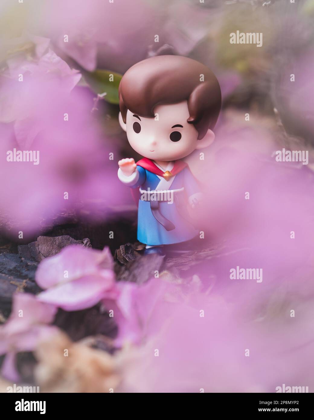 A cute Pop Mart toy figurine of Prince Phillip dressed in a traditional ...