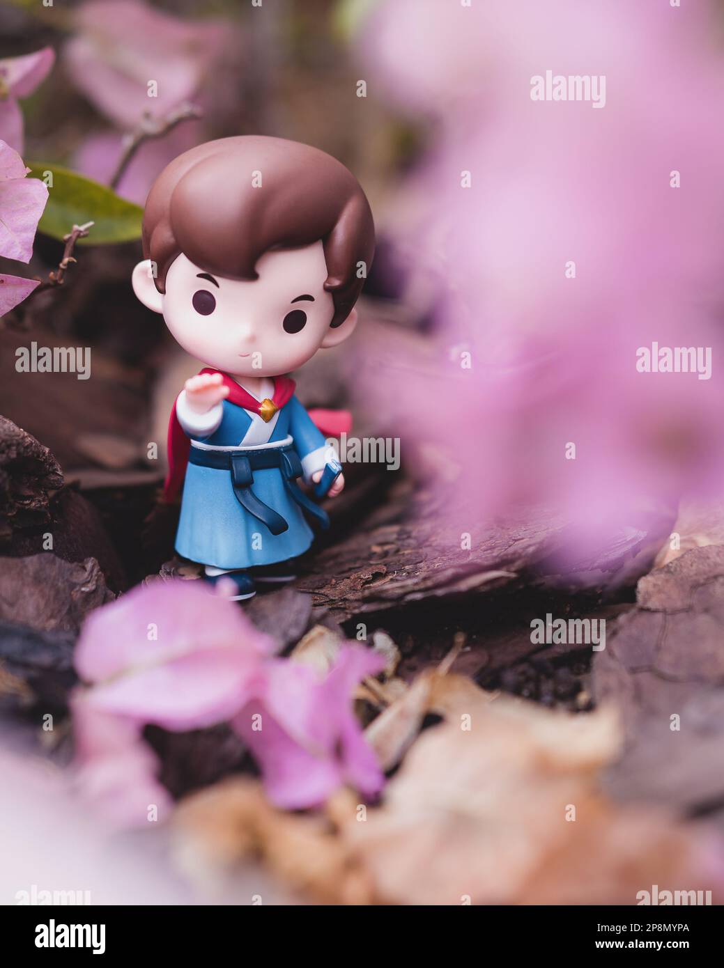 A cute Pop Mart toy figurine of Prince Phillip dressed in a traditional ...