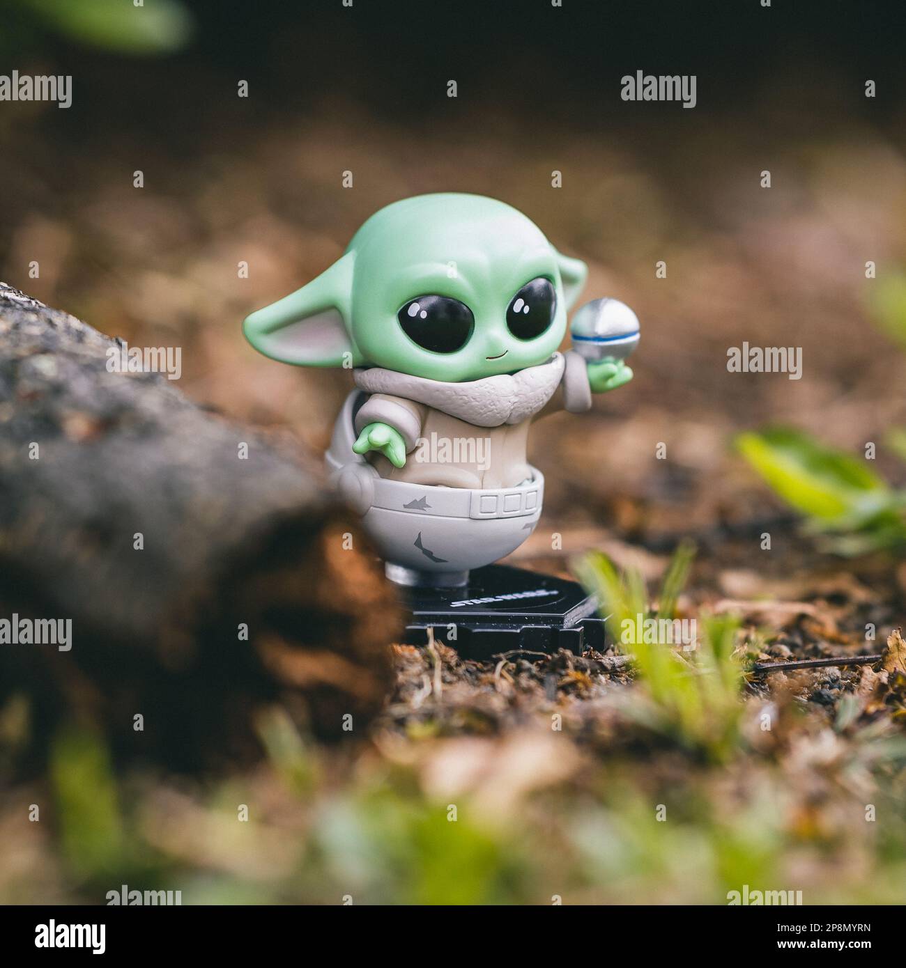 A cute Grogu figurine from the Cosbi blindbox for the Star Wars series ...