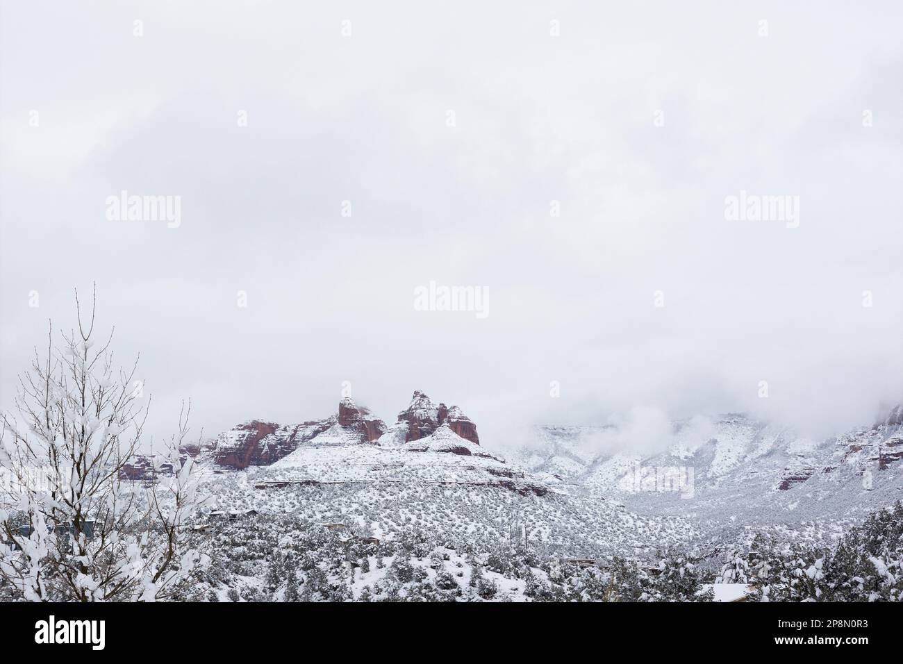 Scenic view of beautiful red rocks covered in snow in Sedona, Arizona ...