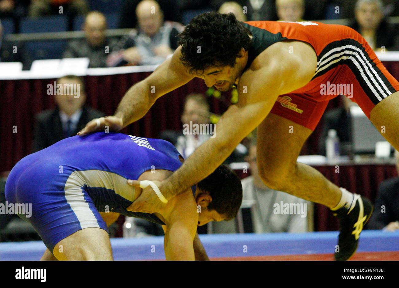 Russian Soslan Ktsoev, red, grapples with Ukrainian Ibragim Aldatov in ...