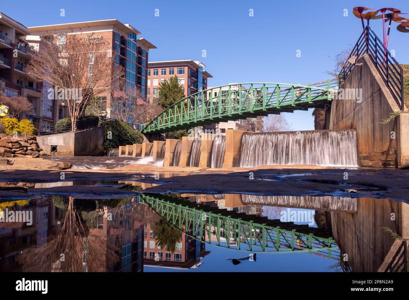 A low-angle view of the walking Eugenia Duke bridge with a reflection ...