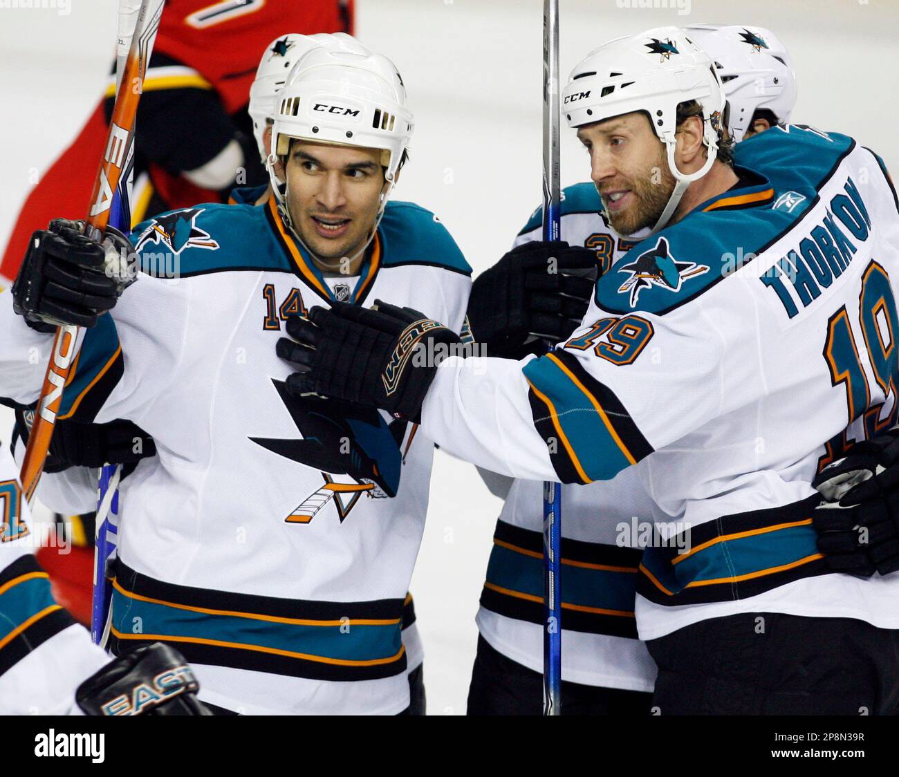 San Jose Sharks' Jonathan Cheechoo, left, celebrates his goal with ...