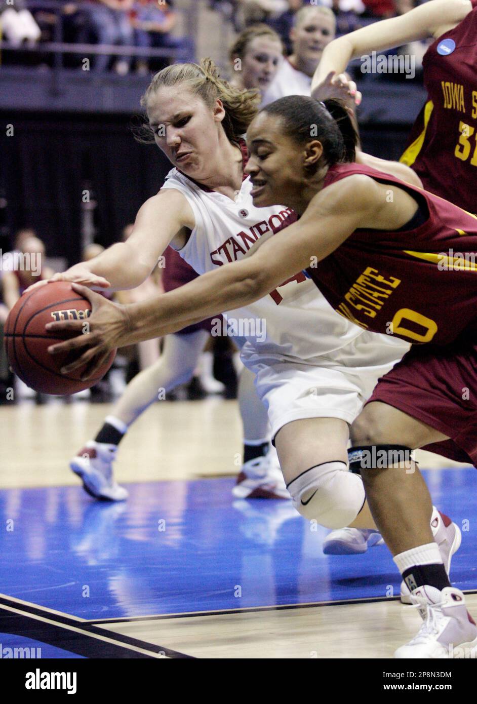 Stanford forward Kayla Pedersen, left, battles for a loose ball with ...