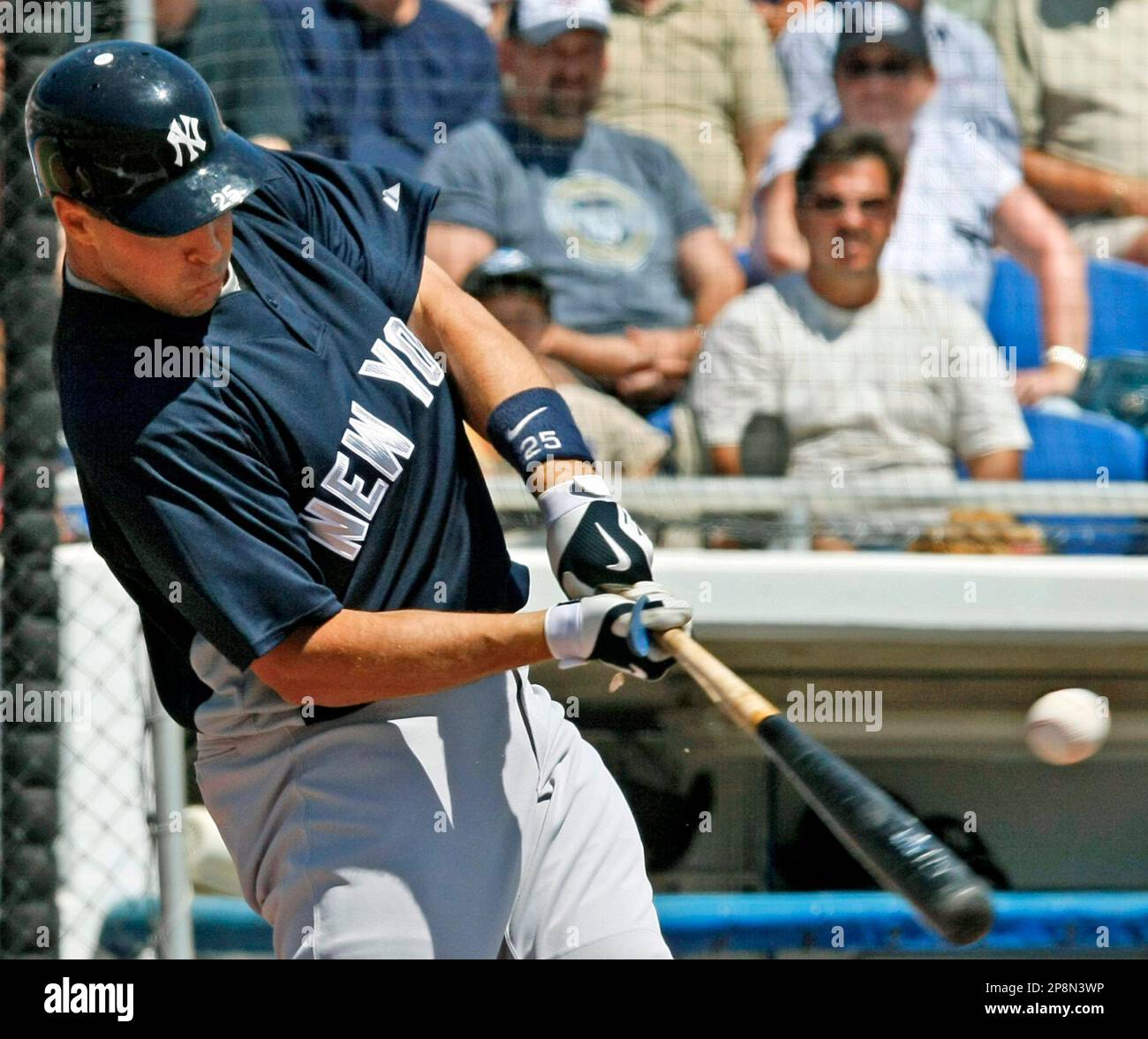 New York Yankees' Mark Teixeira hits a first-inning RBI single in the ...