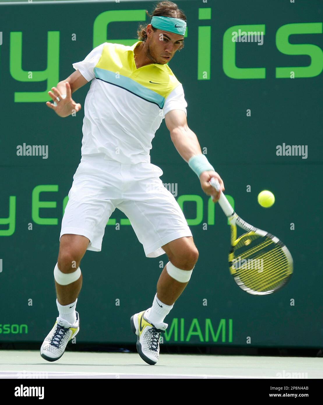 Rafael Nadal, from Spain, makes a return against Frederico Gil during ...