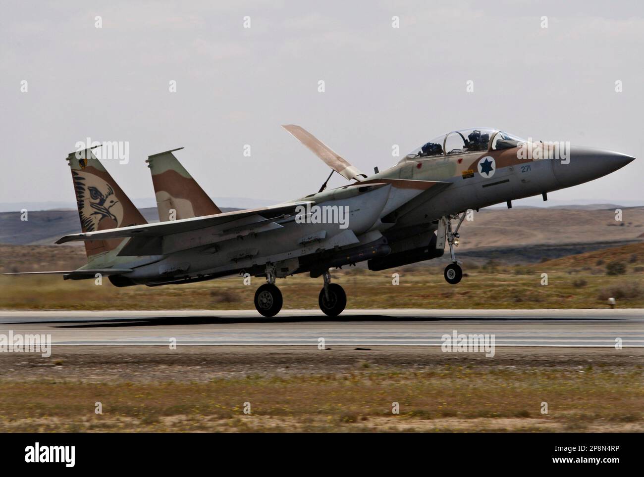 An Israeli airforce F15i fighter jet lands in the Hatzerim military ...