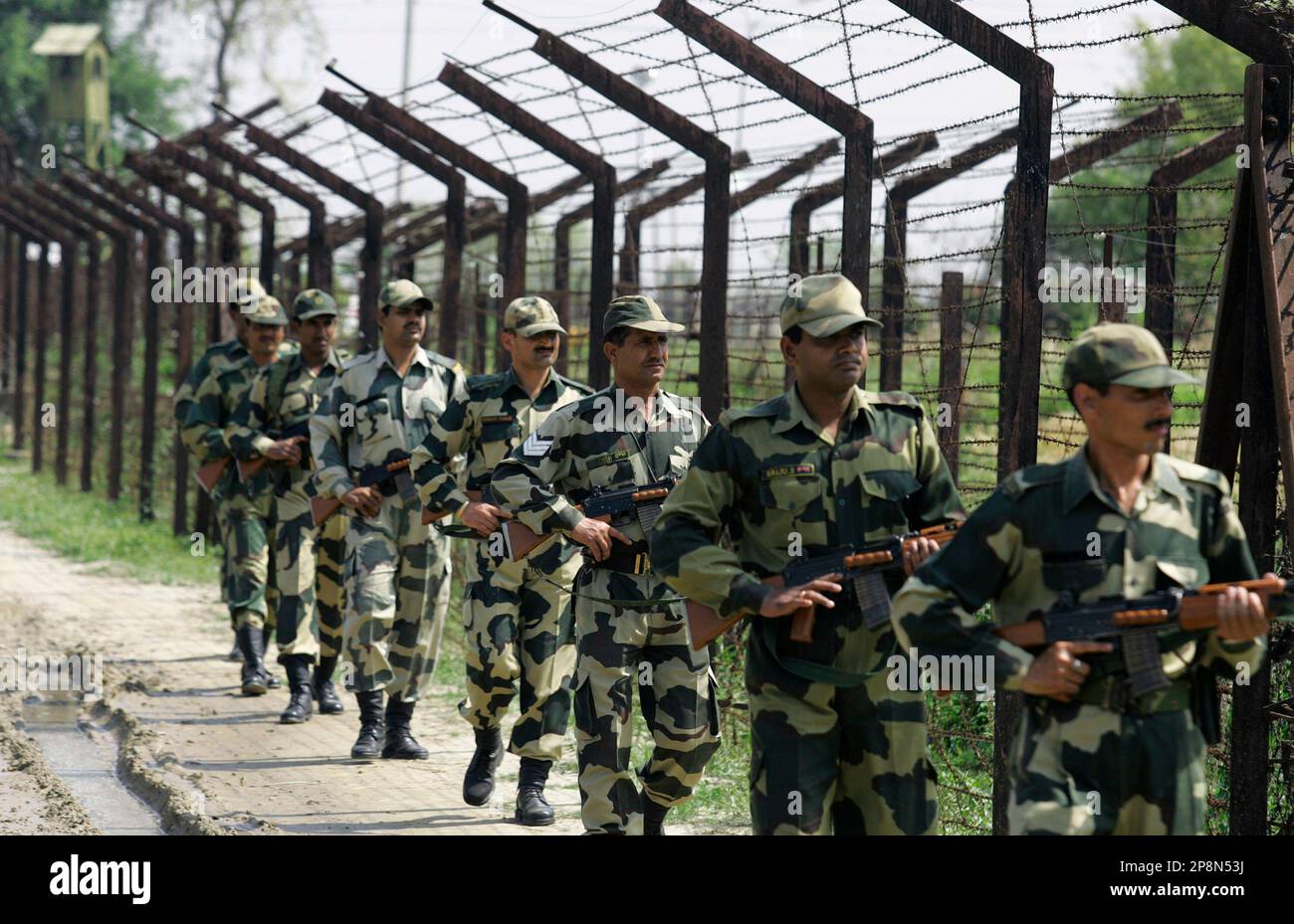 Indian Border Security Force soldiers patrol at the international ...