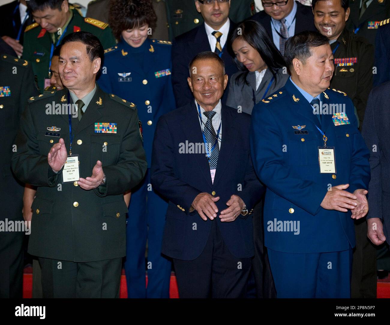 Philippines Commodore Carlos L. Agustin, foreground center, stands ...