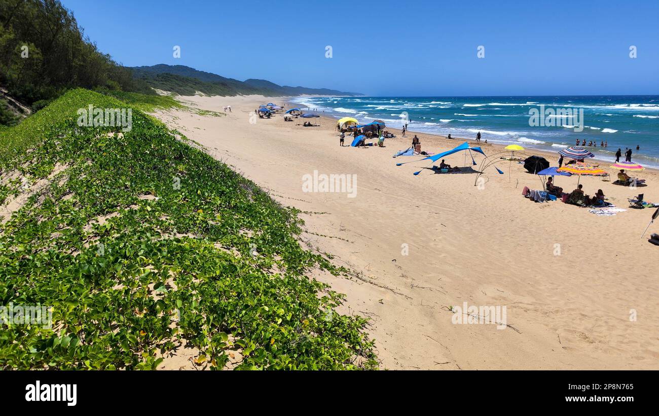 Cape Vidal, South Africa - 14 January 2023: people on the beach of Cape ...