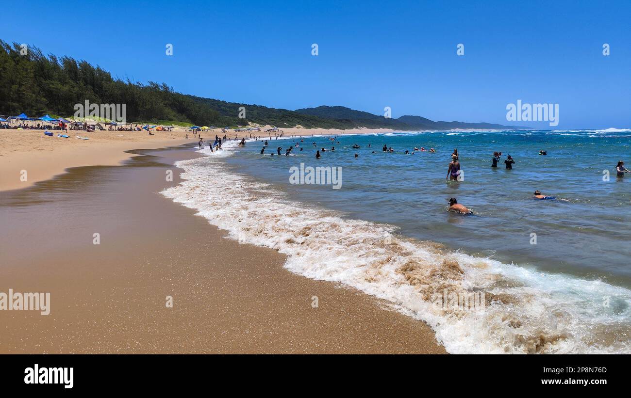 Cape Vidal, South Africa - 14 January 2023: people on the beach of Cape ...