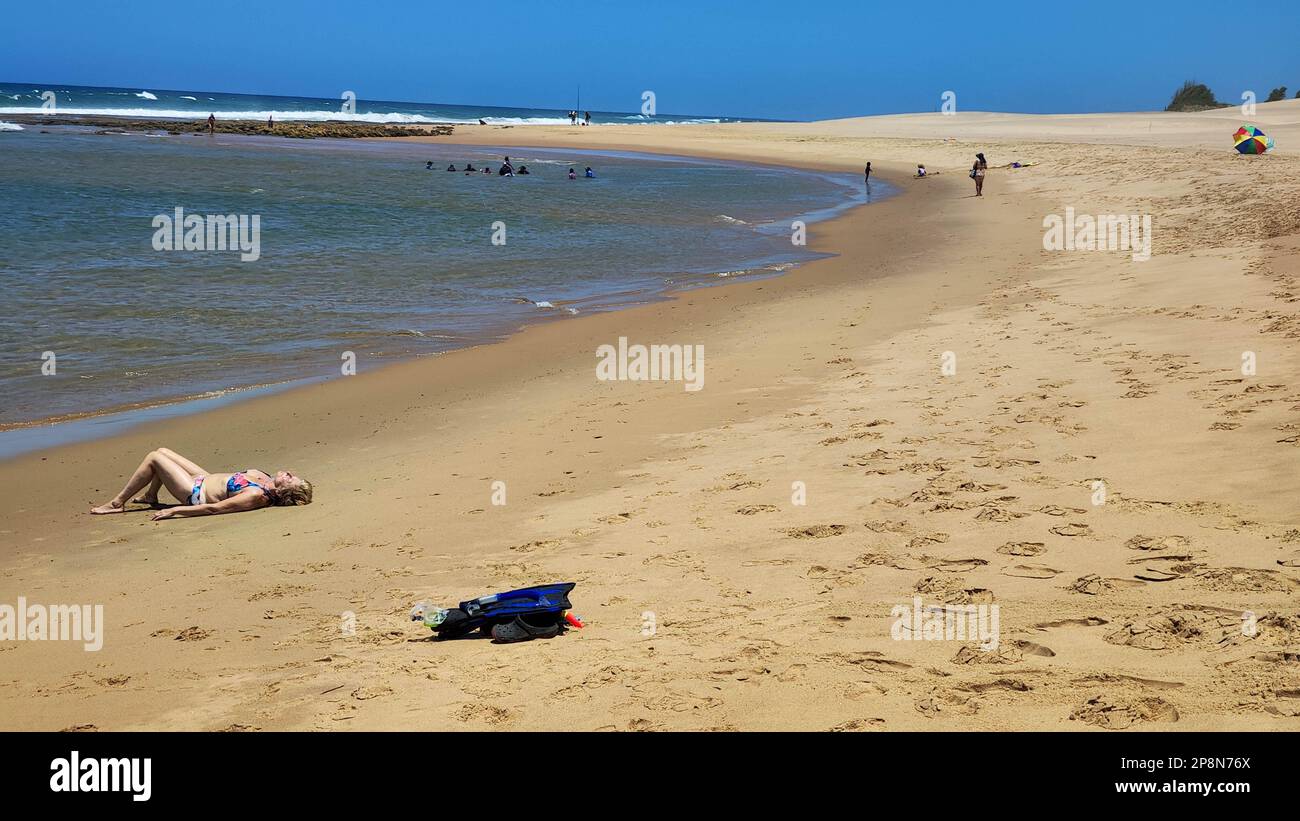 Cape Vidal, South Africa - 14 January 2023: people on the beach of Cape ...