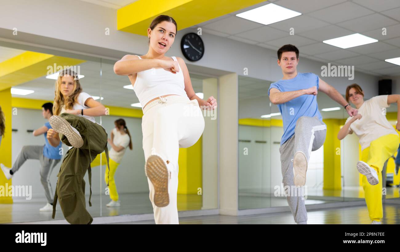 Young girl dancing modern dance in studio Stock Photo - Alamy